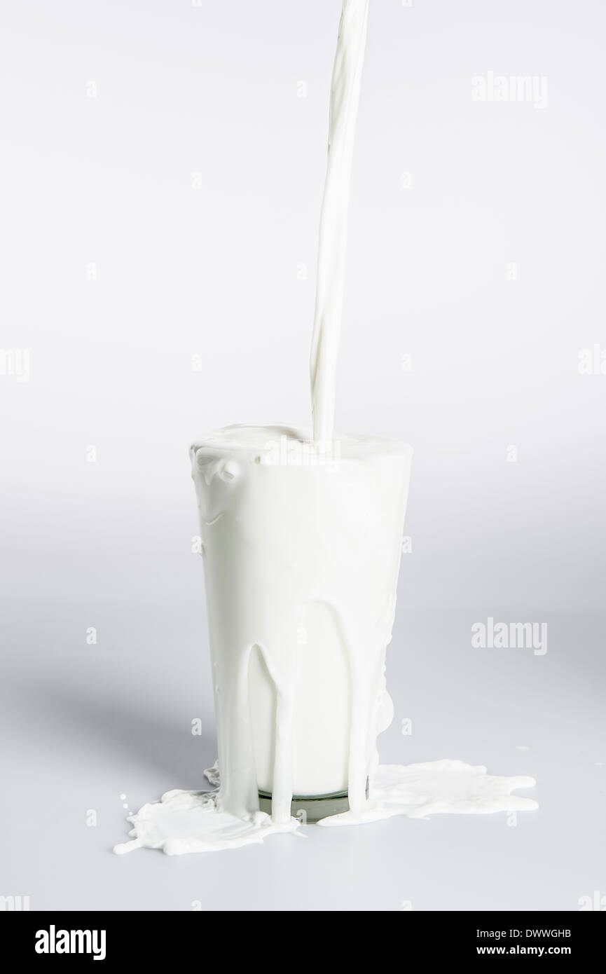 Milk being poured into glass hi-res stock photography and images - Alamy