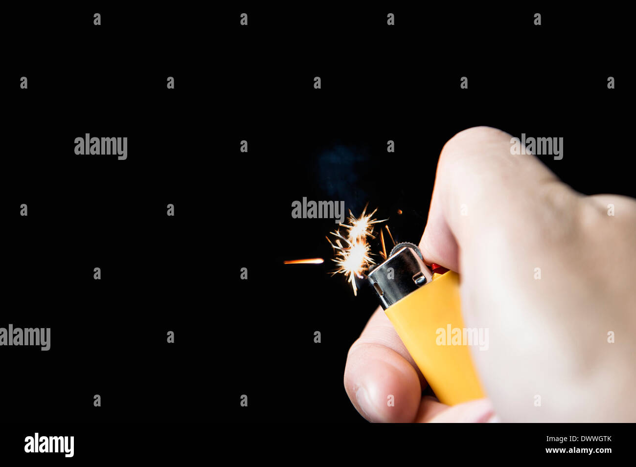 a lighter being light Stock Photo - Alamy