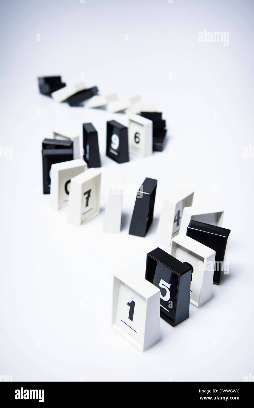domino pieces with numbers falling Stock Photo - Alamy