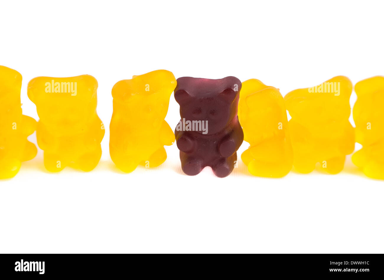 Row of colorful gummy bears on isolated white background Stock Photo ...