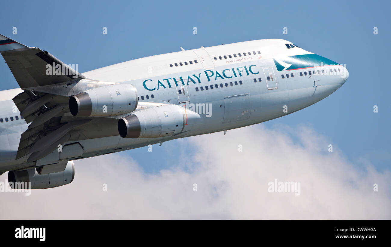 Cathy Pacific Passenger Aircraft taking off and climbing up at Hong ...