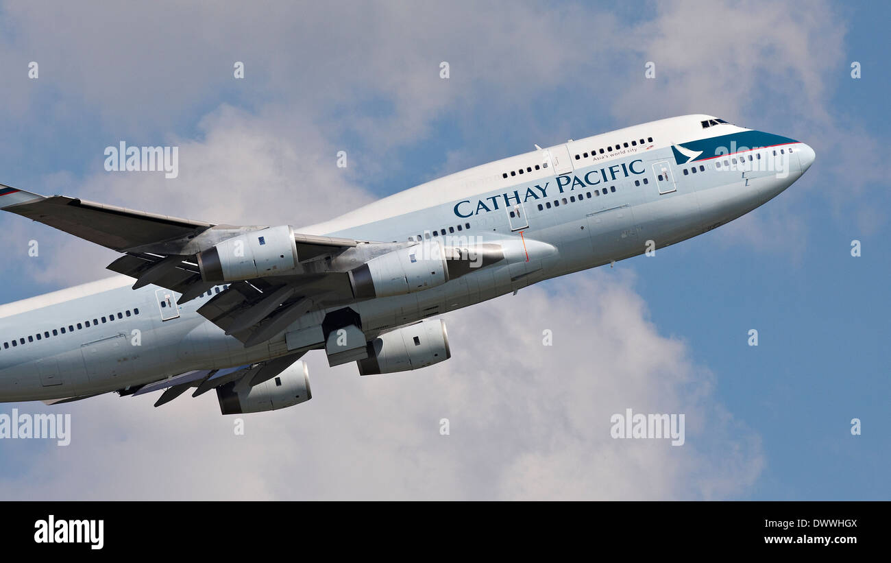 Cathy Pacific Passenger Aircraft taking off and climbing up at Hong ...