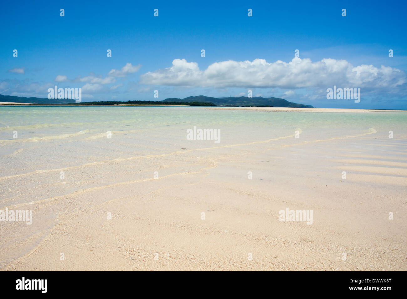 Clear water on white sand beach, Okinawa Prefecture, Japan Stock Photo ...