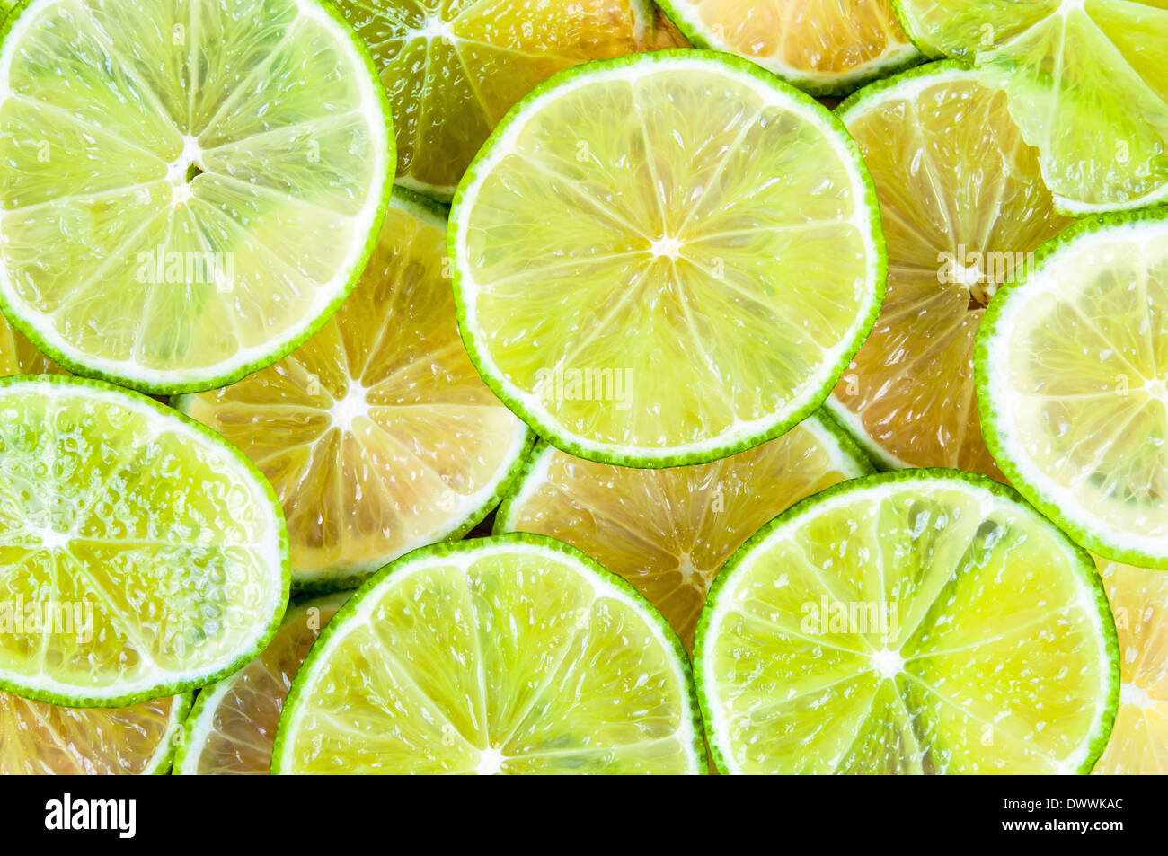 Background made of fresh ripe lime slices Stock Photo - Alamy