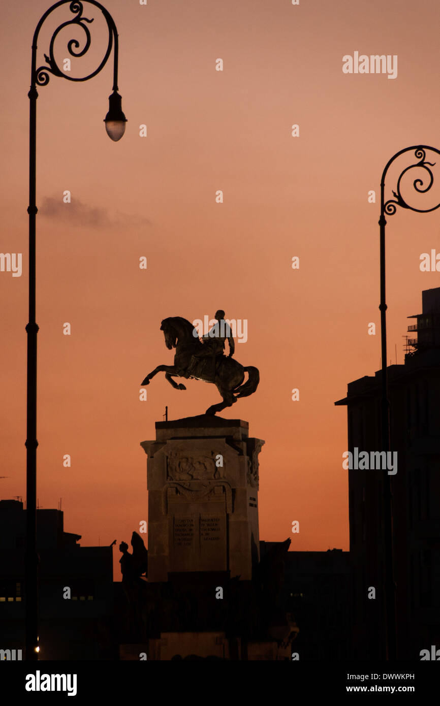 Silhouette of Monumento a Antonio Maceo statue and street lampposts in ...