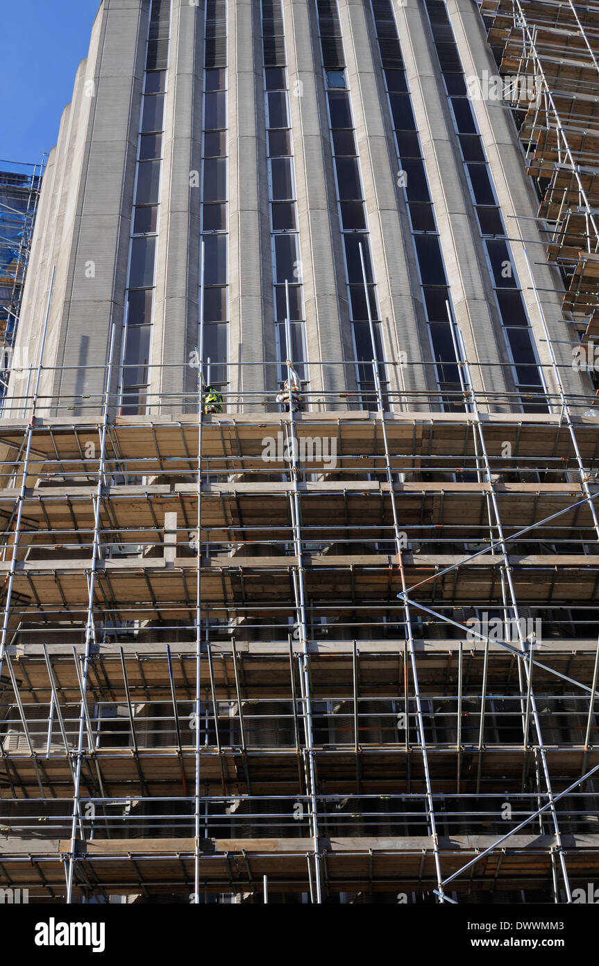 Construction site in London with scaffolding and builders working Stock ...