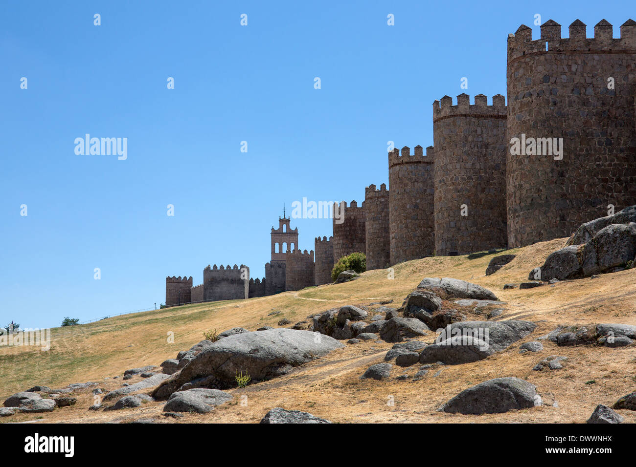 The medieval city walls around the city of Avila in the Castilla-y-Leon ...