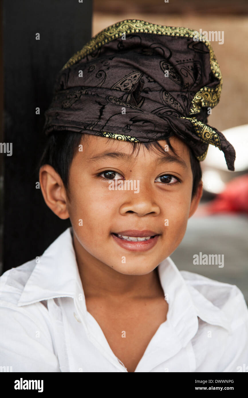 Portrait of a Balinese boy taking part in Hindu religious ceremony in ...