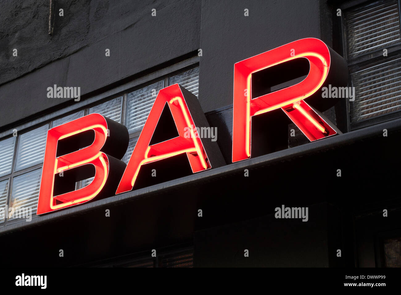 Red bar sign outside a bar and grill Stock Photo - Alamy
