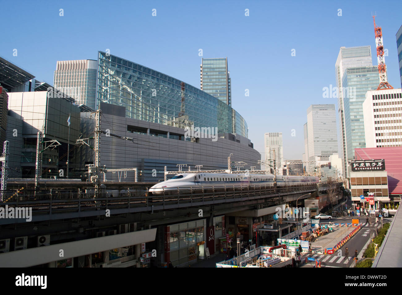 Bullet train going through Yurakucho, Tokyo, Japan Stock Photo - Alamy