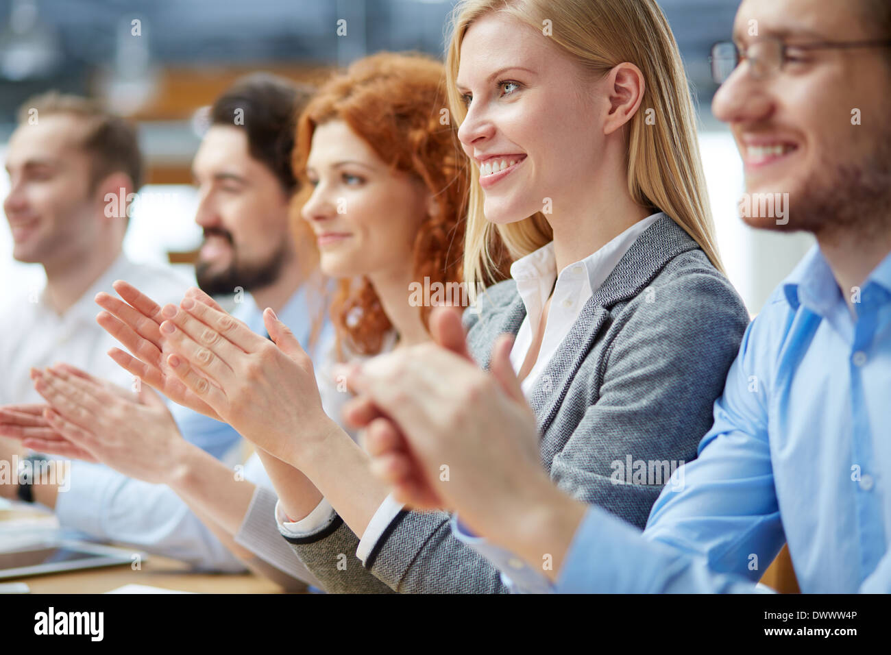 Clapping blonde hi-res stock photography and images - Alamy