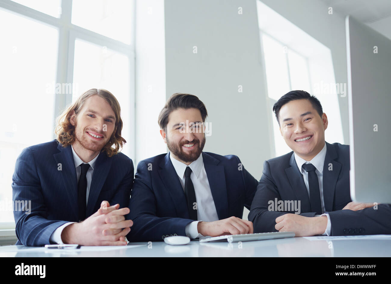 Portrait of three successful entrepreneurs looking at camera Stock ...
