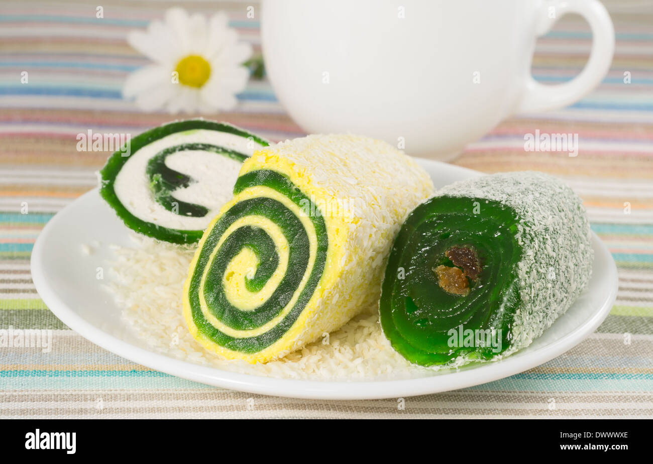 roll sweet dessert with chamomile flower, closeup, Arabia Culture Stock ...