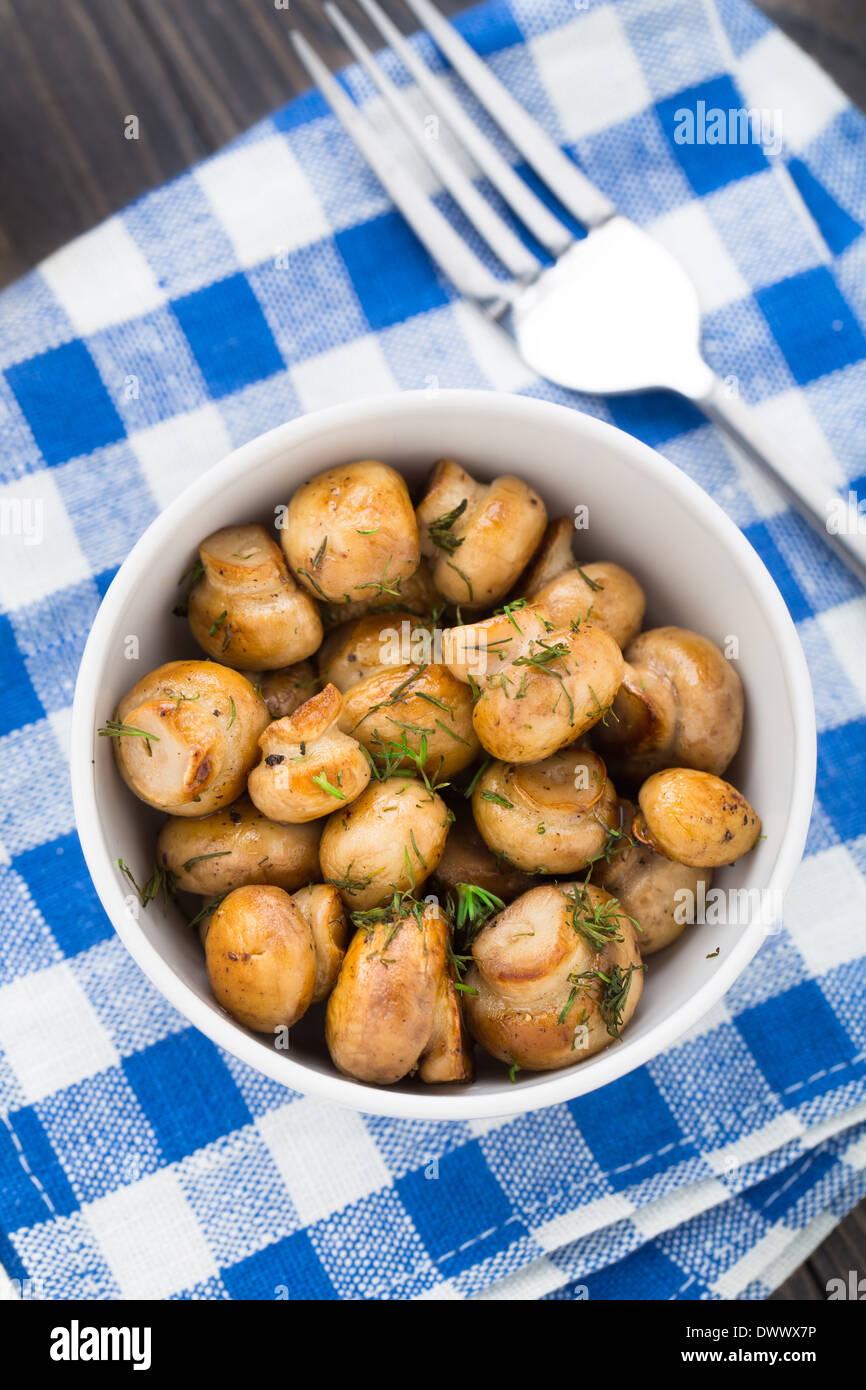 Pan sauteed mushrooms in a bowl Stock Photo - Alamy