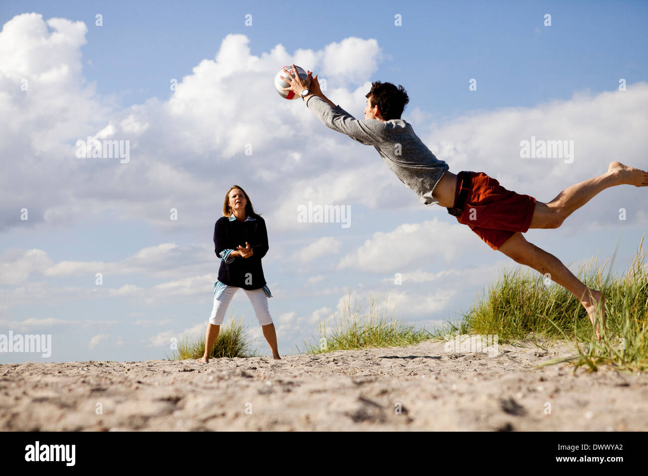 Diving to catch ball hi-res stock photography and images - Alamy