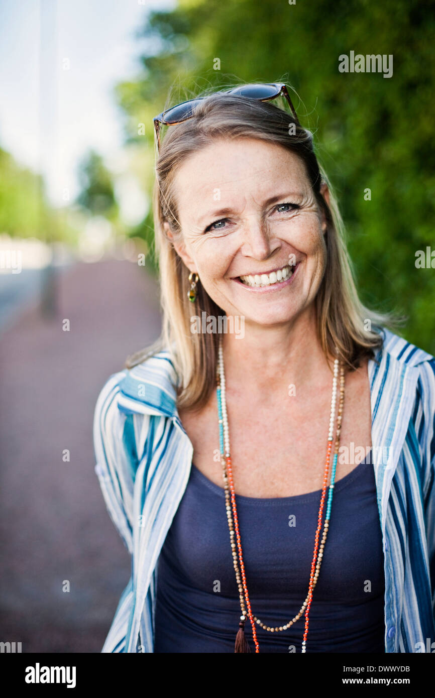 Woman 50s portrait smiling hi-res stock photography and images - Alamy