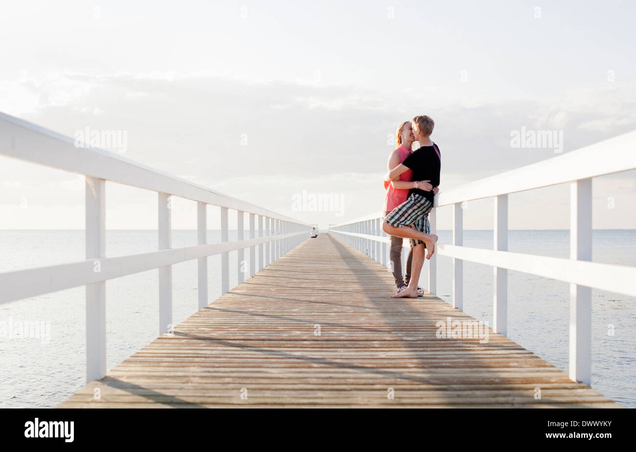 Couple kissing on dock hi-res stock photography and images - Alamy