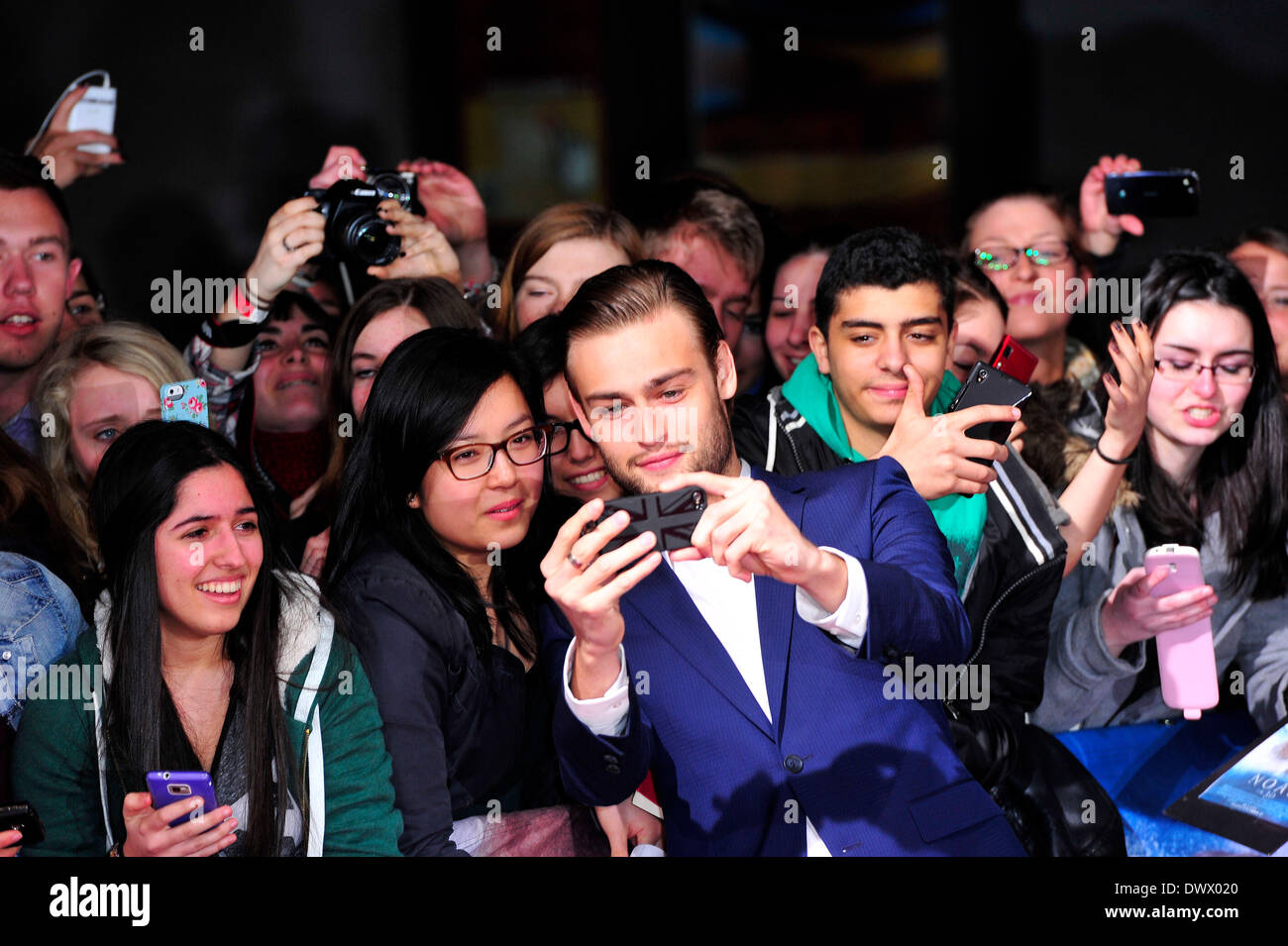 British actor Douglas Booth attend the "Noah" Germany Film Premiere at ...