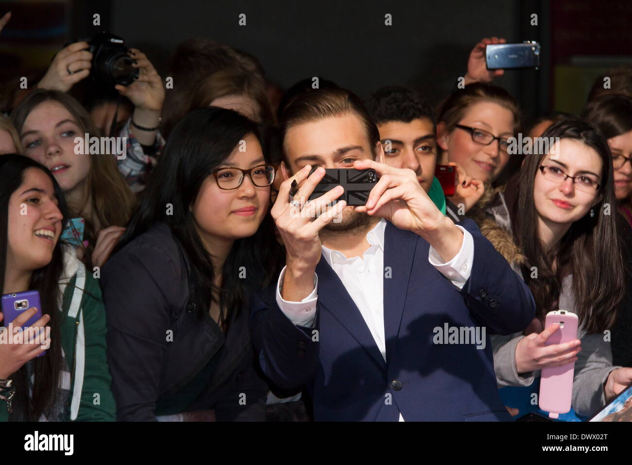 British actor Douglas Booth attend the "Noah" Germany Film Premiere at ...