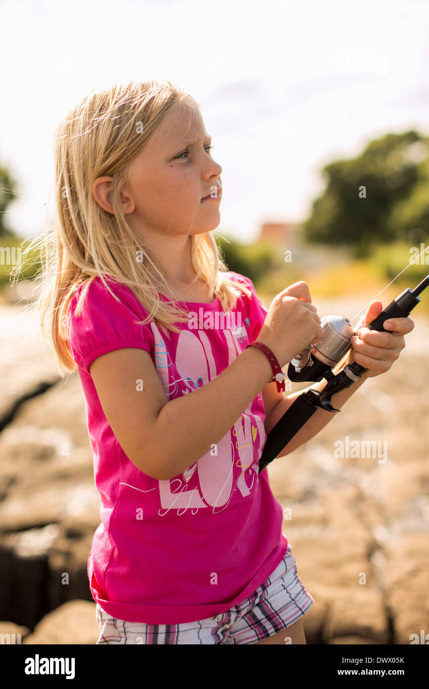 Fishing holding hi-res stock photography and images - Alamy