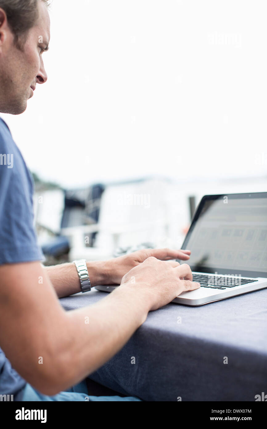 Man mature age works laptop hi-res stock photography and images - Alamy