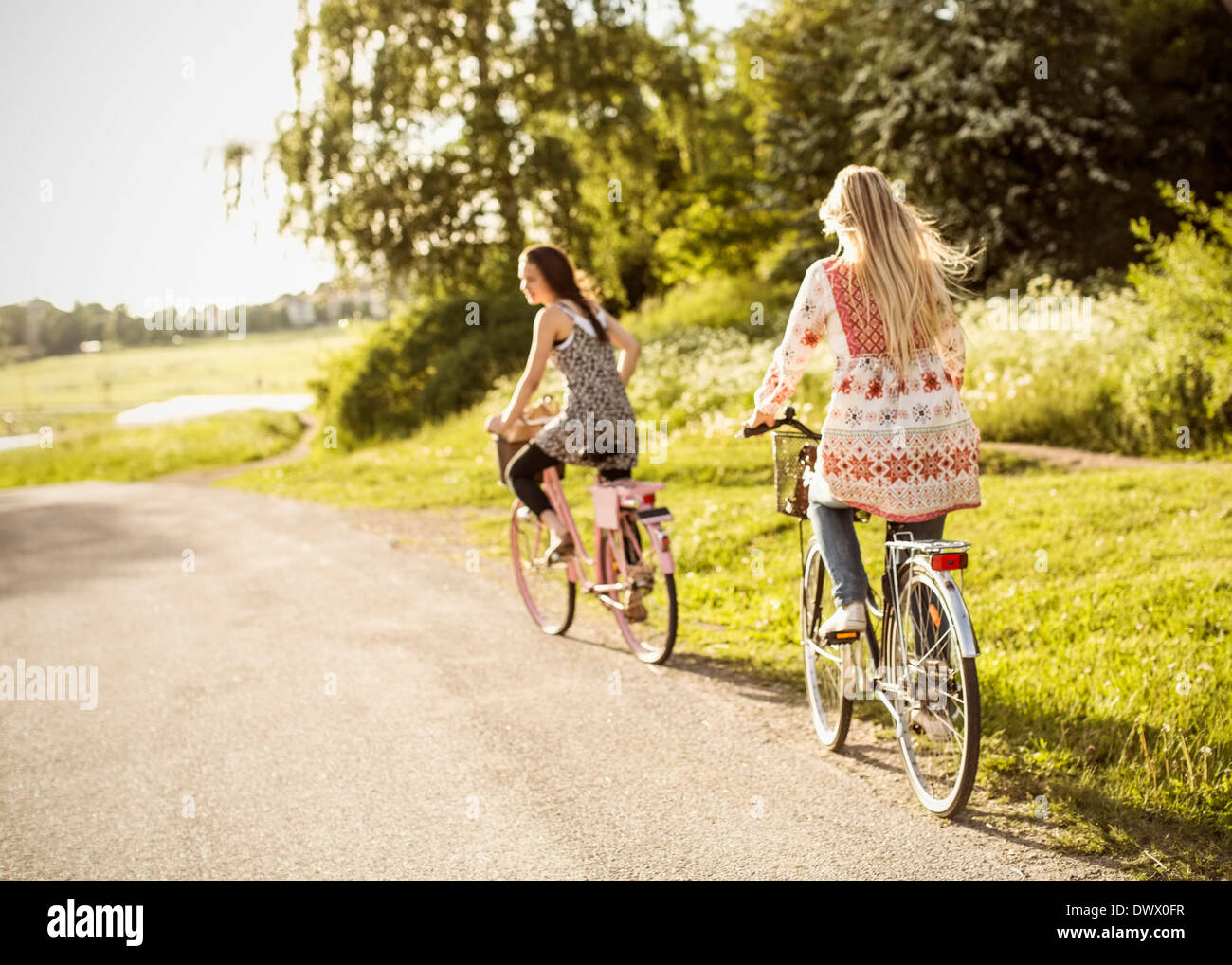 Young day sitting biking cycling rear hi-res stock photography and ...