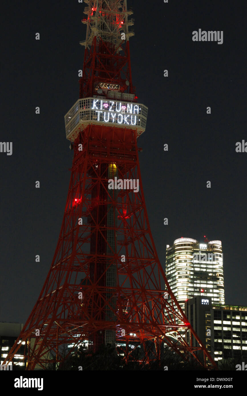 Tokyo, Japan. 11th Mar, 2014. Tokyo Tower displays a message "Kizuna ...