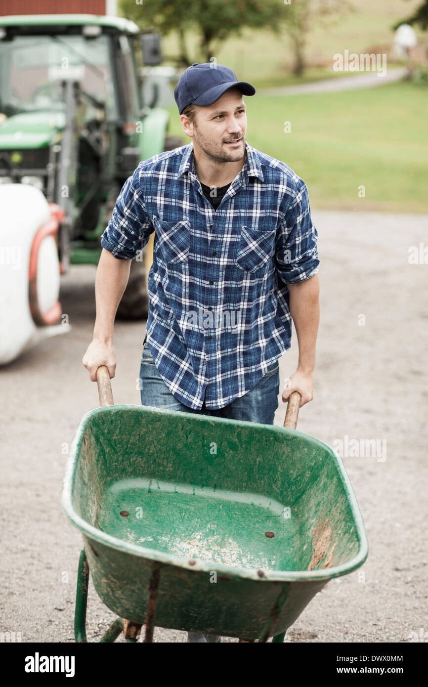 Wheelbarrow walk hi-res stock photography and images - Alamy