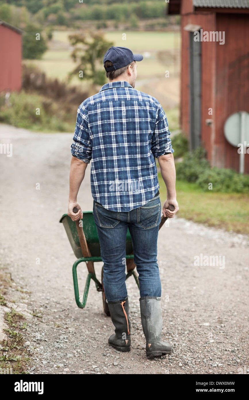Wheelbarrow walk hi-res stock photography and images - Alamy