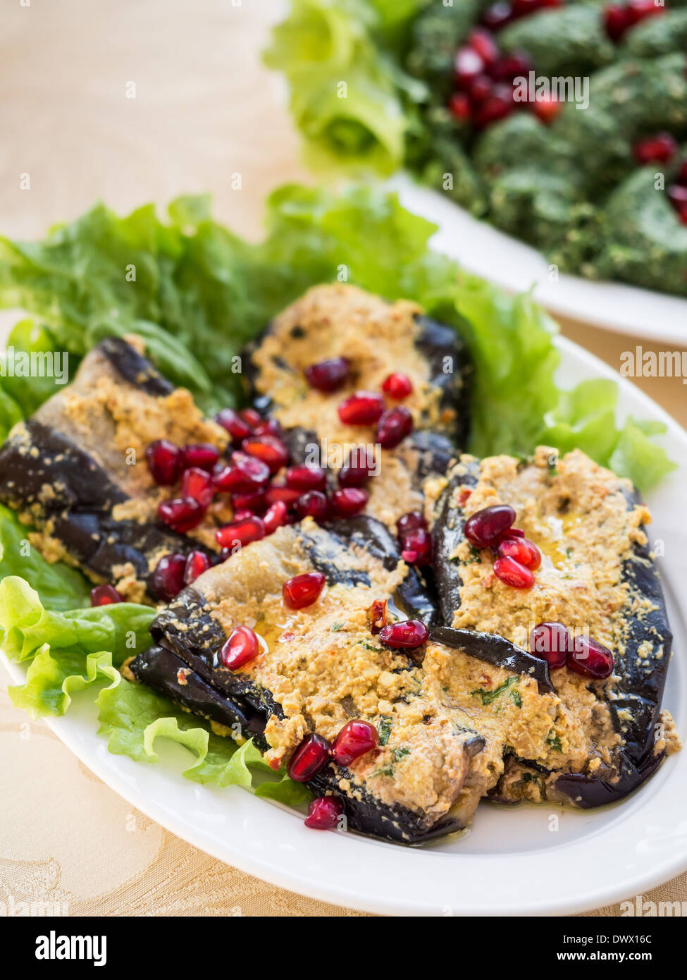 Traditional Georgian cold starter, eggplant with walnuts, served with ...