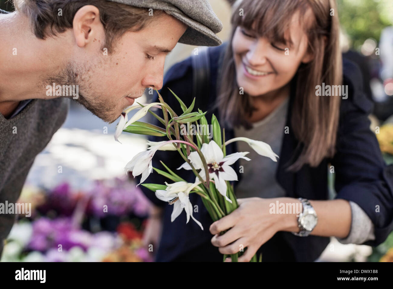 Woman sniffing man hi-res stock photography and images - Alamy