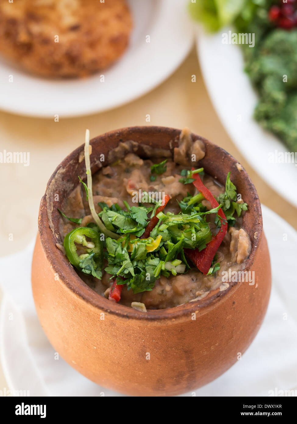 Lobio, a traditional Georgian bean dish in a clay container Stock Photo ...