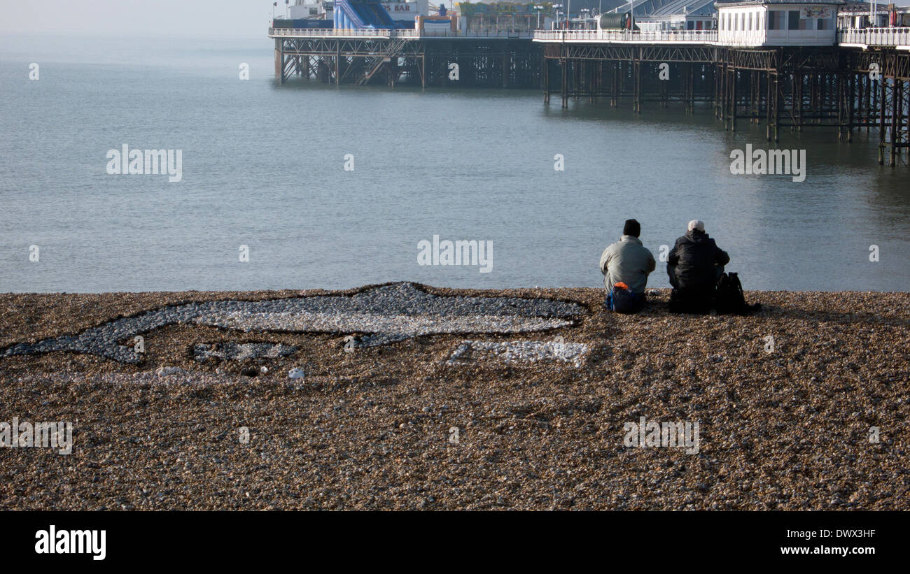 Pebbles on beach with pier hi-res stock photography and images - Alamy