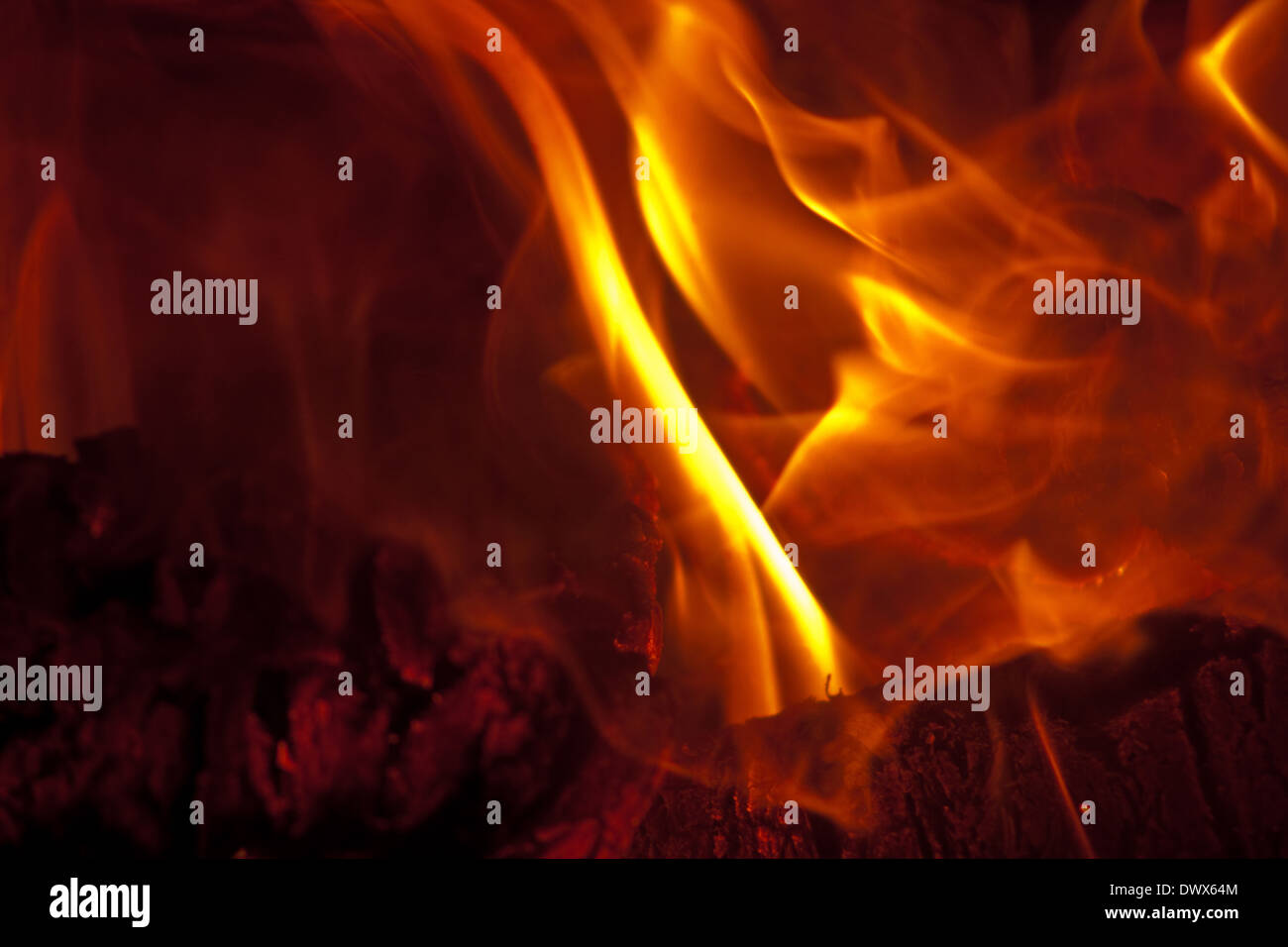 Flames in a wood burning stove Stock Photo - Alamy