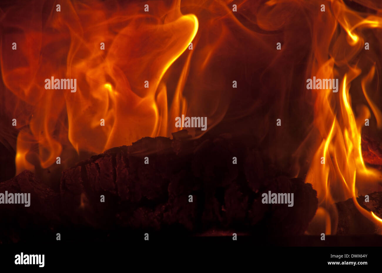 Flames in a wood burning stove Stock Photo - Alamy