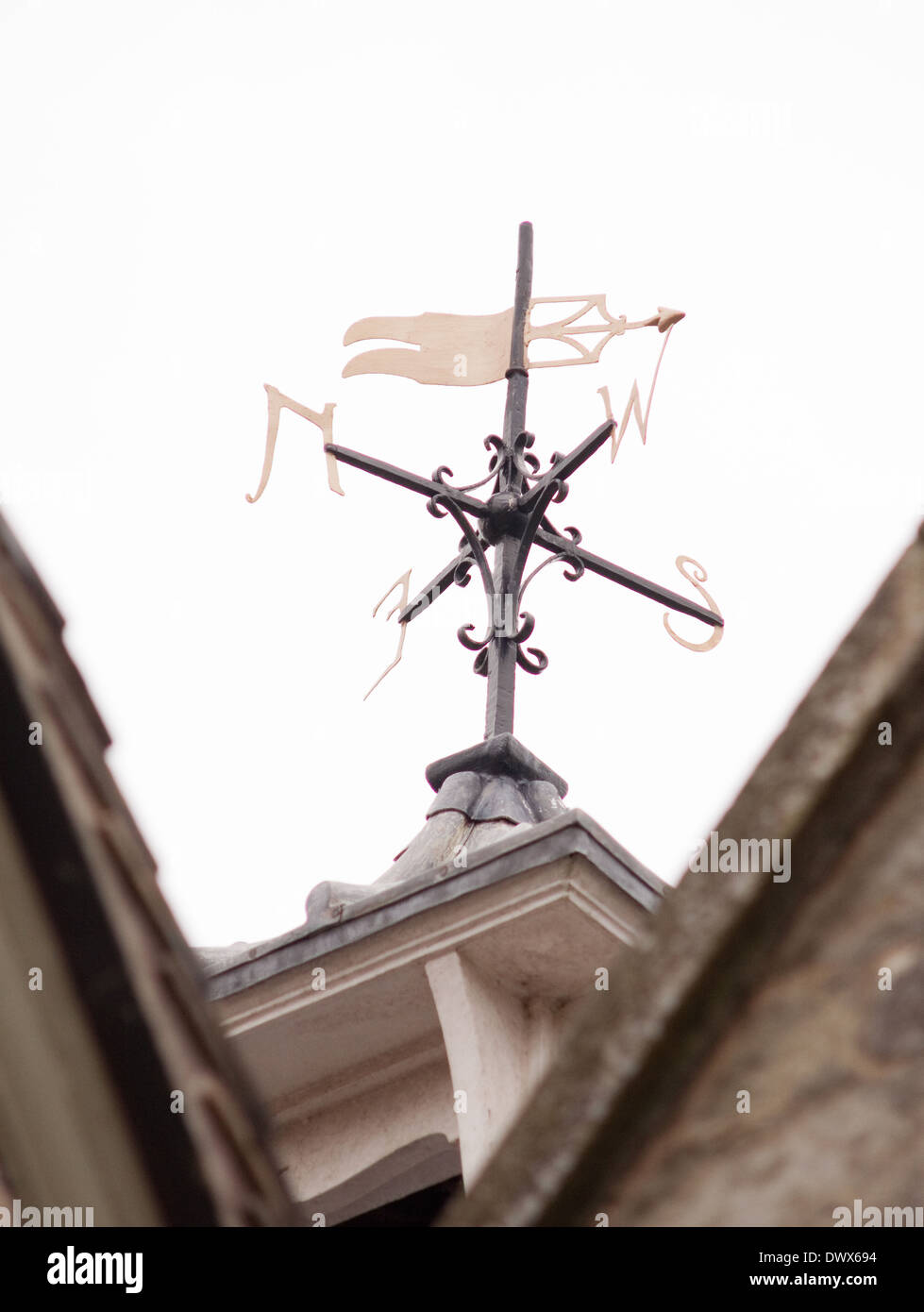Weathervane on an English manor house, in the art and crafts style ...