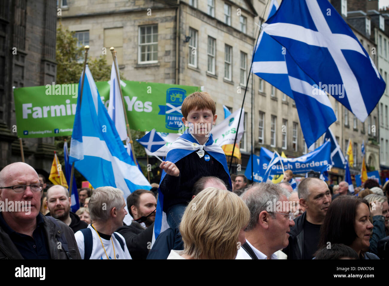 Crowds marching through the streets of Edinburgh during a pro ...