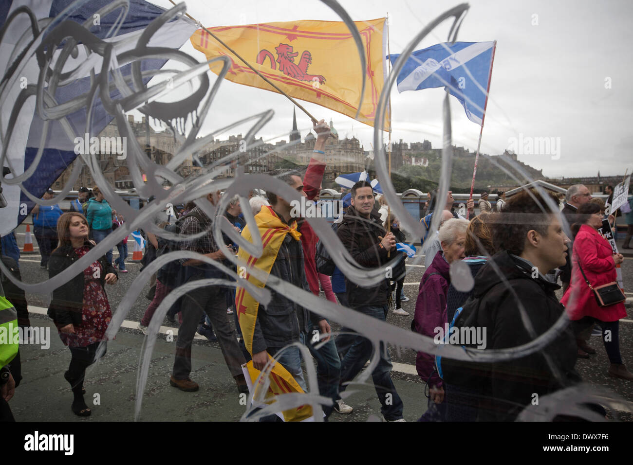 Crowds marching through the streets of Edinburgh during a pro ...