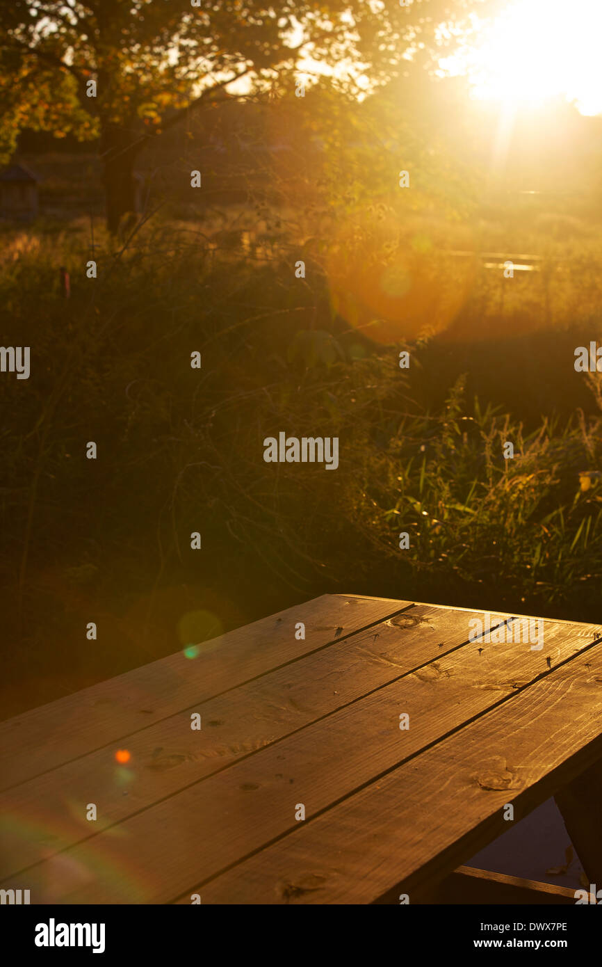 Sunset seen from a picnic table Stock Photo - Alamy