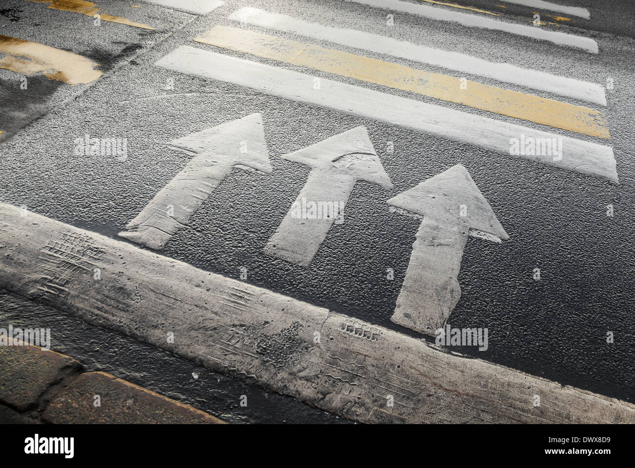 Pedestrian crossing road marking with arrows and lines on asphalt Stock ...