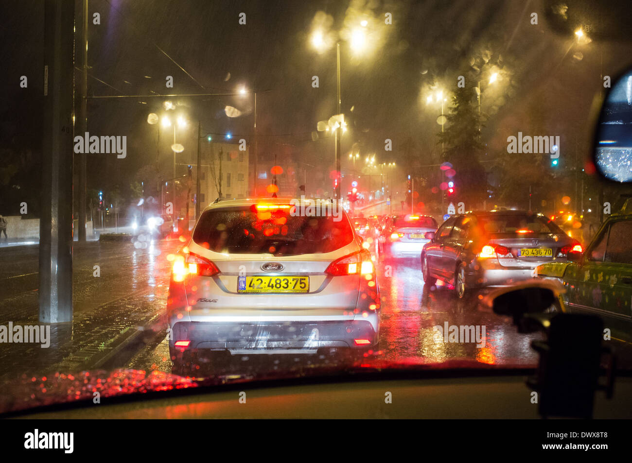 Driver's view while driving on a rainy night Stock Photo - Alamy