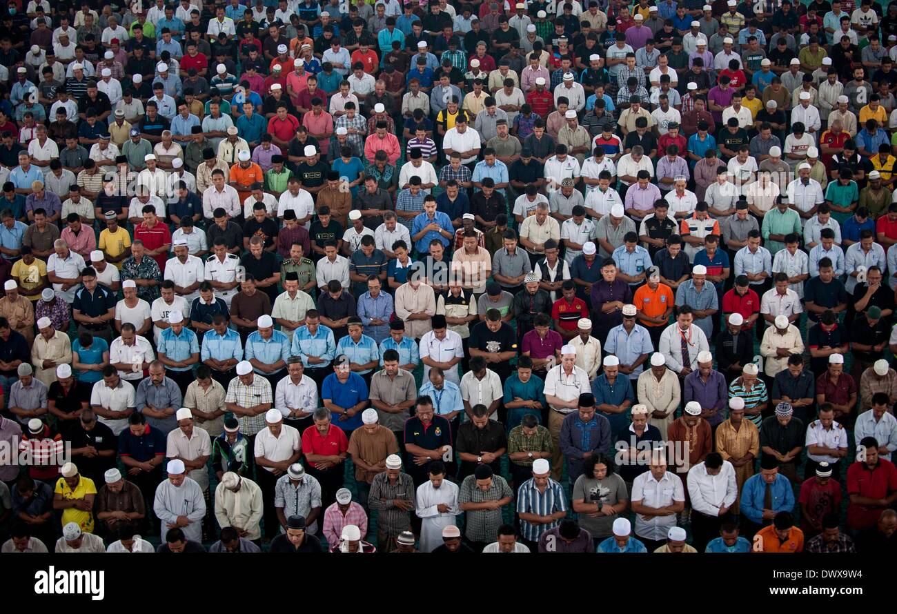 Kuala Lumpur, Malaysia. 14 March 2014. Malaysian Muslims pray at a ...