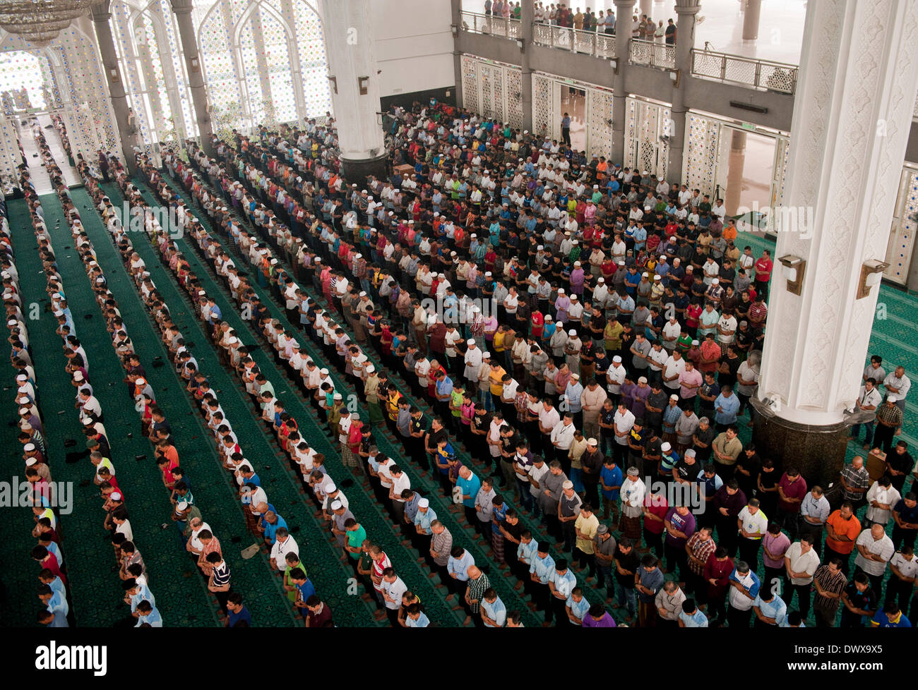 Kuala Lumpur, Malaysia. 14 March 2014. Malaysian Muslims pray at a ...