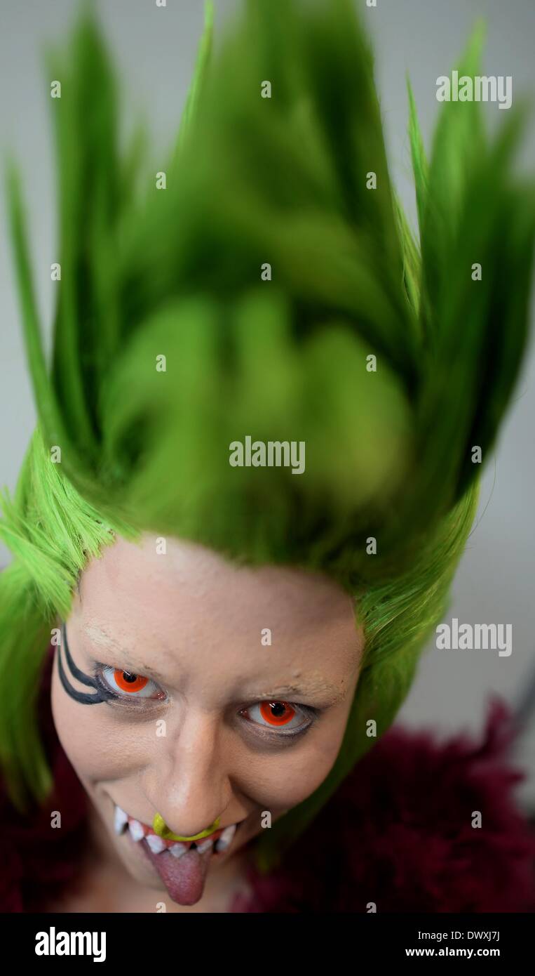 Leipzig, Germany. 14th Mar, 2014. Cosplayer Angelina poses for the ...