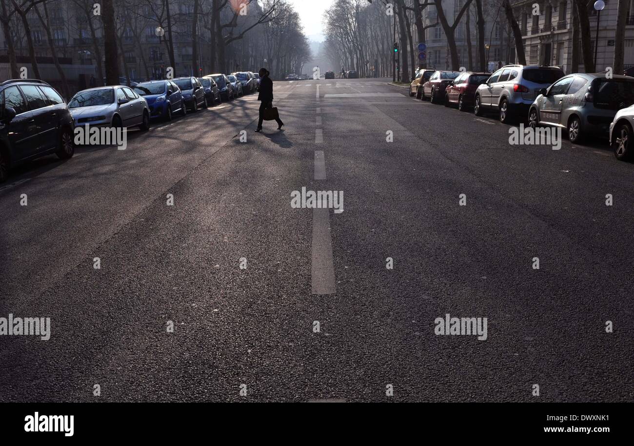 Paris, France. 14th Mar, 2014. Vehicles are parked in a street during ...