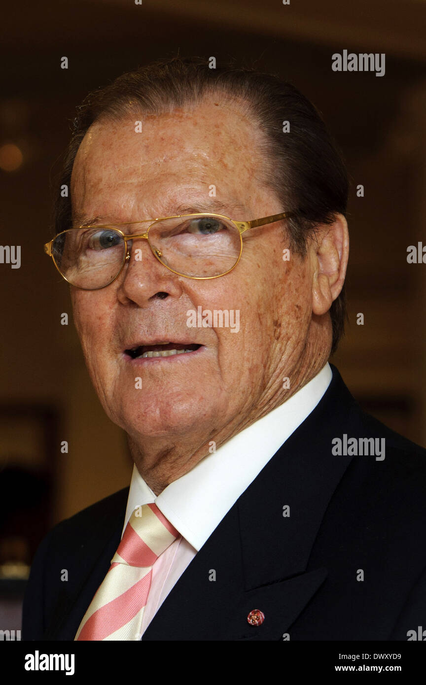Sir Roger Moore signs copies of his new book 'Bond On Bond' at Harrods ...