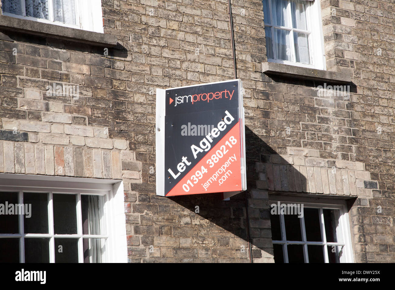 Jsm property let agreed estate agents sign on building hi-res stock ...