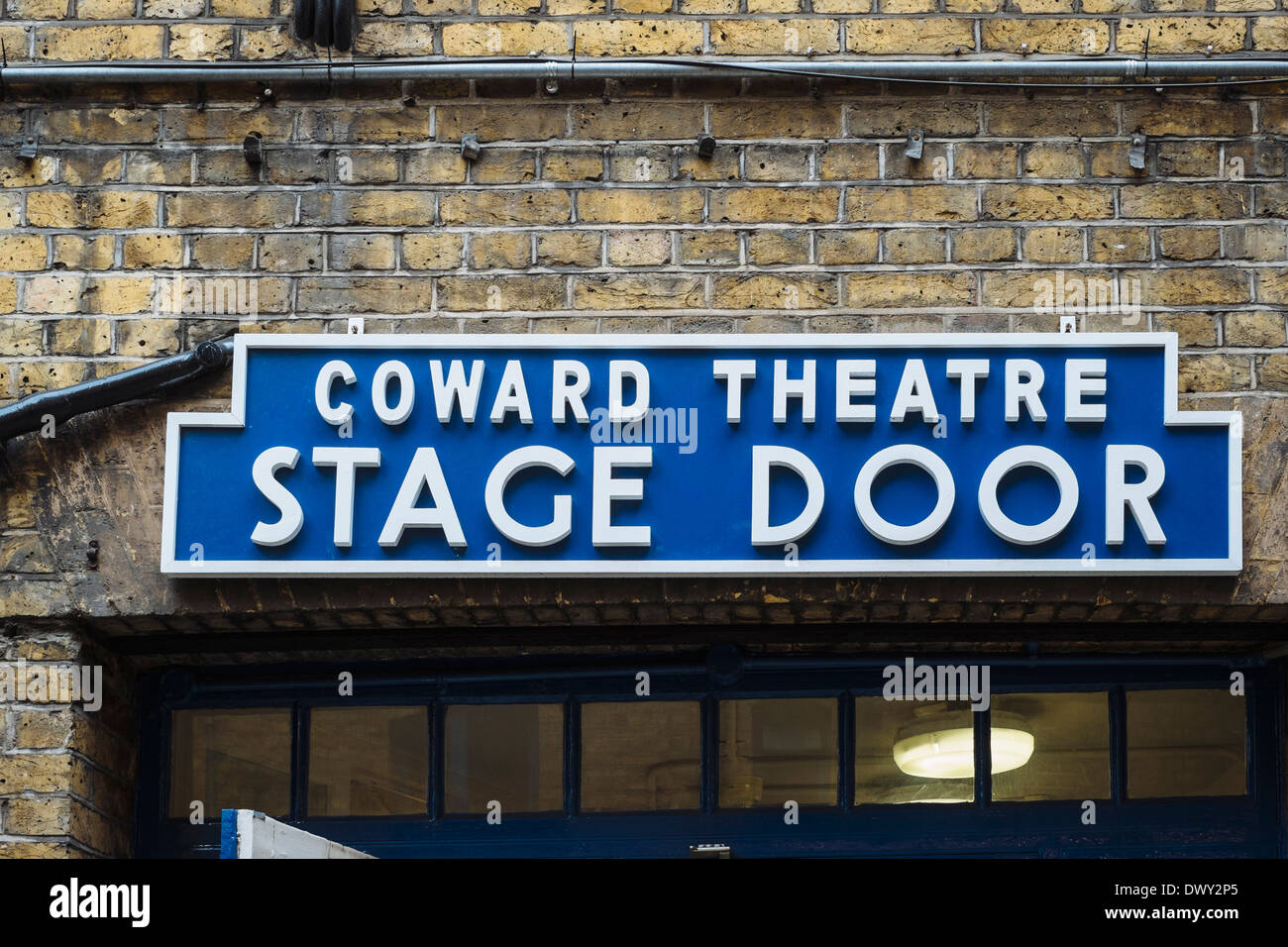 Coward Theatre stage door sign Stock Photo - Alamy