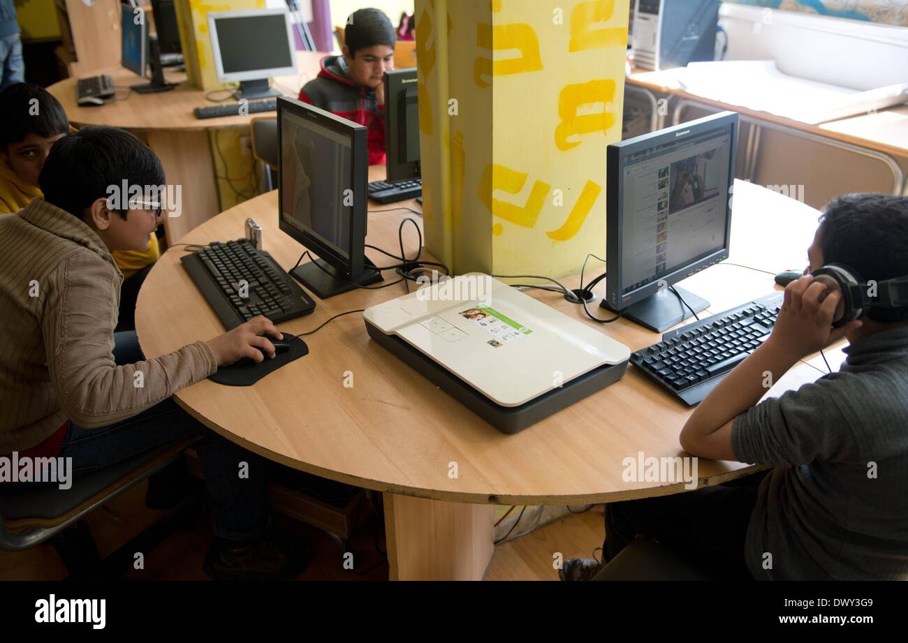 Amman, Jordan. 01st Mar, 2014. dpa-exclusive - Children spend their ...