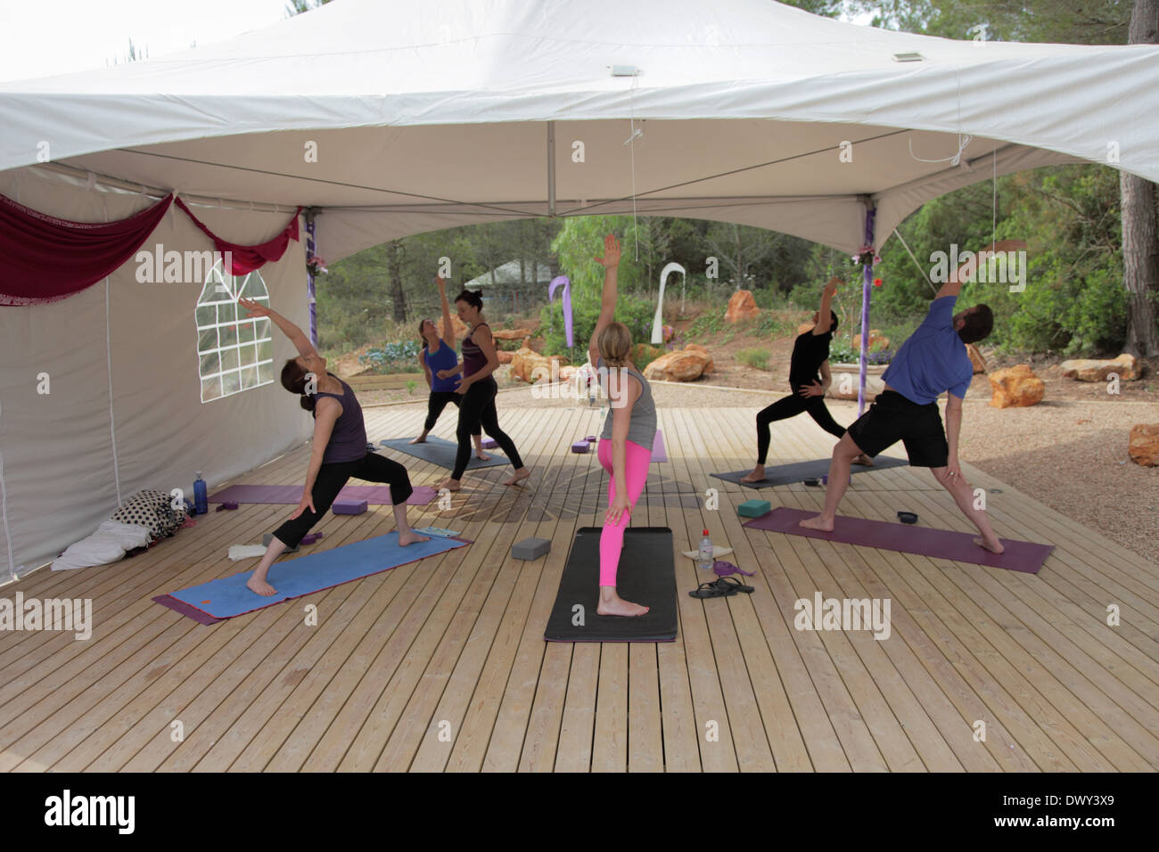 Yoga practice in circle Stock Photo - Alamy